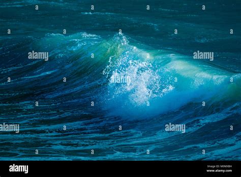Breaking Wave On The Cornish Coast Stock Photo Alamy