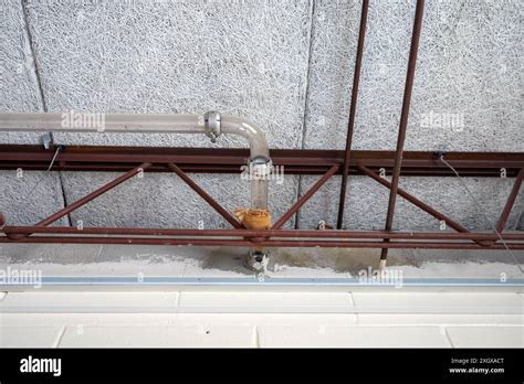 Old Ceiling Mounted Glass Drain Vent Pipes In School Science Room Or