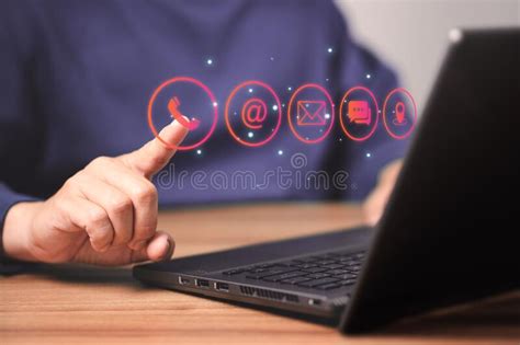 man using a computer laptop and touching on technology virtual screen