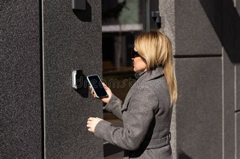 Female Entering Secret Key Code For Getting Access And Passing Building Using Application On