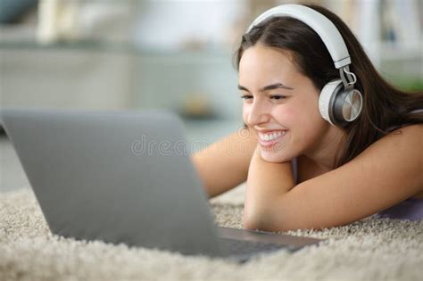 Happy Woman With Headphone Checks Laptop Stock Image Image Of Listen