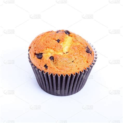 新鲜自制的蛋糕和松饼，麻布编织纹理背景。有选择性的重点。