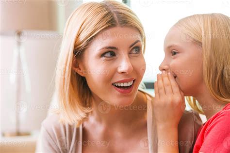 Sharing Secrets With Mom Happy Mother And Daughter Sharing Secrets