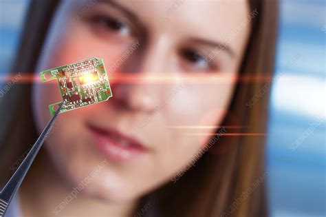Female Electrical Engineer With Chip Stock Image F Science Photo Library