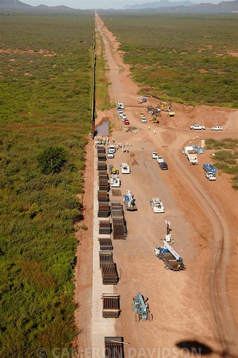 Aerialstock Aerial Photograph Of The Wall Border Fence Between Mexico