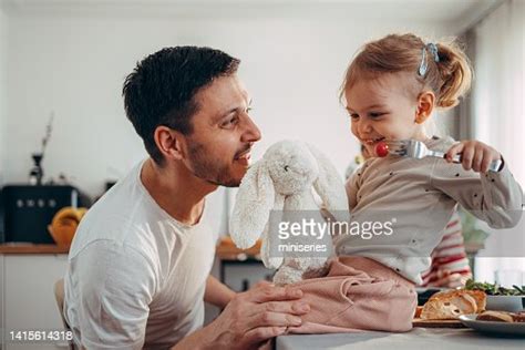Portrait Of Dad And Daughter Bonding While Having Breakfast High Res
