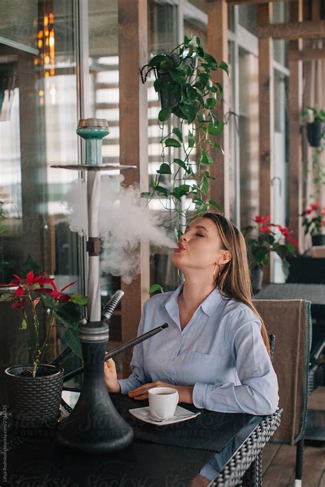 Young Beautiful Woman With Hookah By Stocksy Contributor Liliya