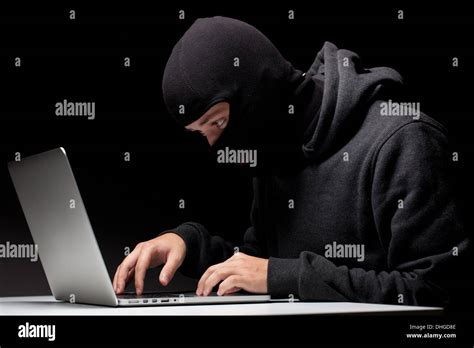 Computer Hacker In A Balaclava Stock Photo Alamy