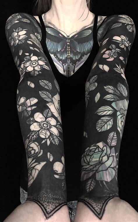 These Striking Solid Black Tattoos Will Make You Want To Go All In