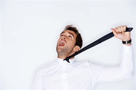 Premium Photo Stress Choke And Tie With A Business Man In Studio On A