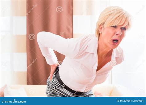 Senior Having Back Pain At Home Stock Image Image Of Woman