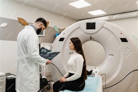 Premium Photo Ct Doctor Consulting Patient And Showing Chest Xray To
