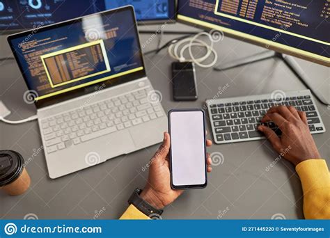 Top View At Unrecognizable Black Man Holding Smartphone Mockup And