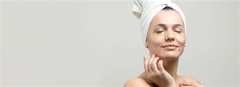 Premium Photo Young Beautiful Girl In A White Towel On His Head Wears