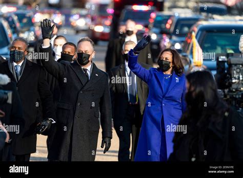 Us Vice President Kamala Harris And Second Gentleman Doug Emhoff Wave