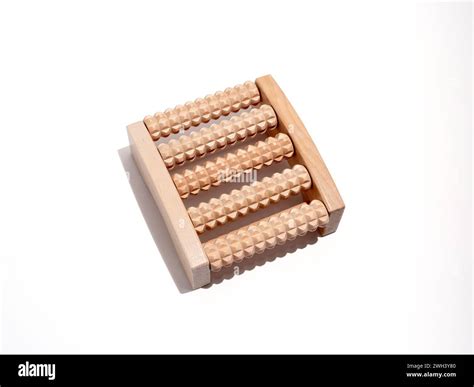 Wooden Foot Massager On A White Background Wooden Massager Close Up