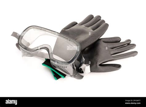 Protective Safety Glasses And Work Gloves Isolated On White Background