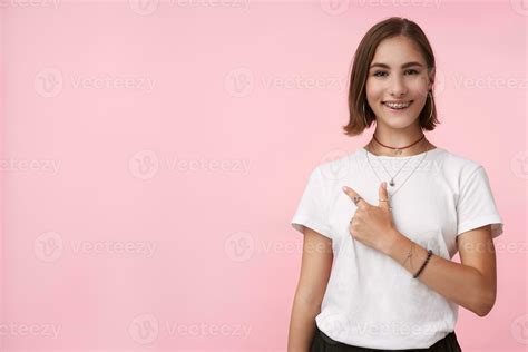 Cheerful Young Lovely Short Haired Brunette Female With Natural Makeup
