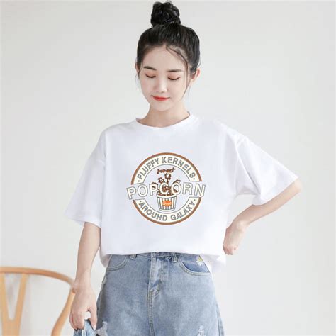 สีขาวtเสื้อยืดแขนสั้นหลวมหญิงinsง่ายๆป่า2021ปีใหม่ในช่วงฤดูร้อนการ์ตูน
