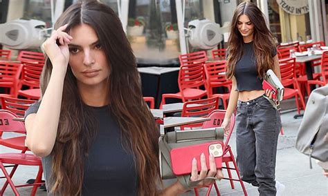 Emily Ratajkowski Gives Peek At Toned Tummy In A Cropped Tee While Out