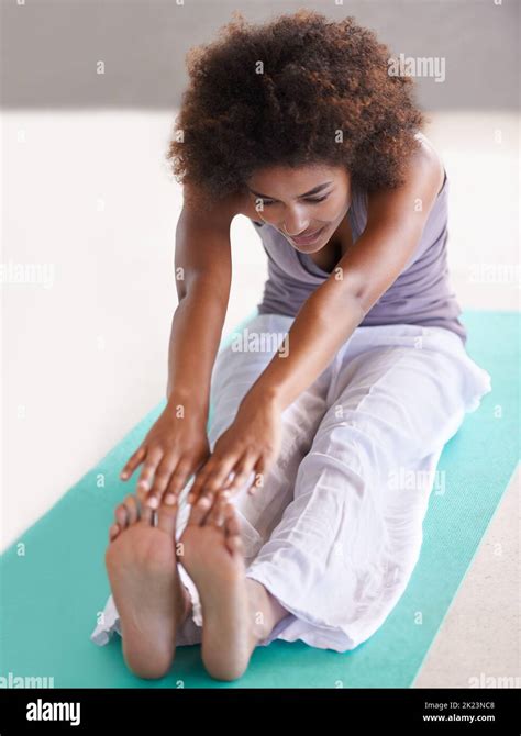 Its Important To Stretch Properly An Attractive Young Woman Stretching