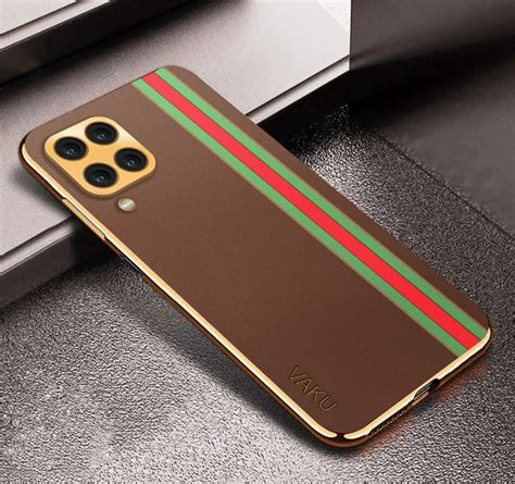 Vaku Samsung Galaxy M G Felix Line Leather Stitched Gold Electroplated Soft TPU Back Cover