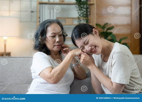 Happy Adult Granddaughter And Senior Grandmother Having Fun Enjoying