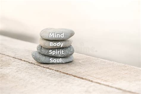 Mind Body Spirit And Soul Words Written On Zen Stones Copy Space And
