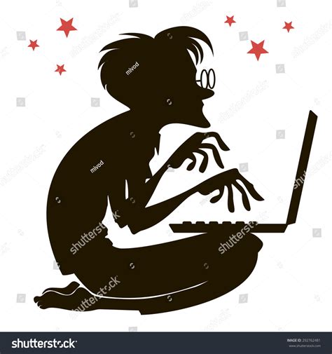 Young Man Sitting With Laptop The Programmer Works On A Computer