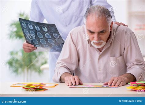 Doctor And Patient Suffering From Alzheimer Disease Stock Image Image