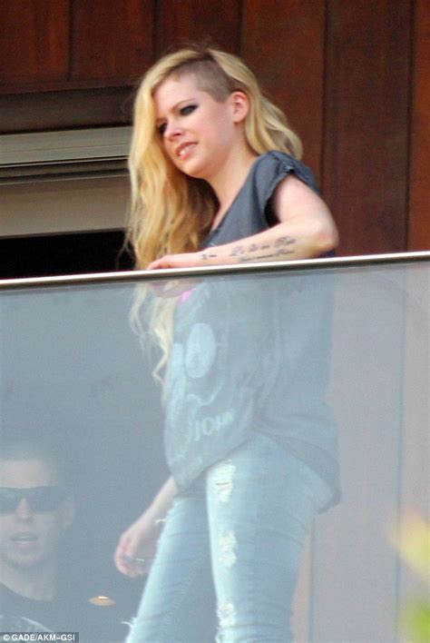 Avril Lavigne Lands In Rio For A Concert AND Some Coconut Juice At The Same Luxury Hotel Where