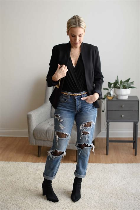 Black Leggings Under Ripped Jeans Stay Warm Look Cute The Mom Edit