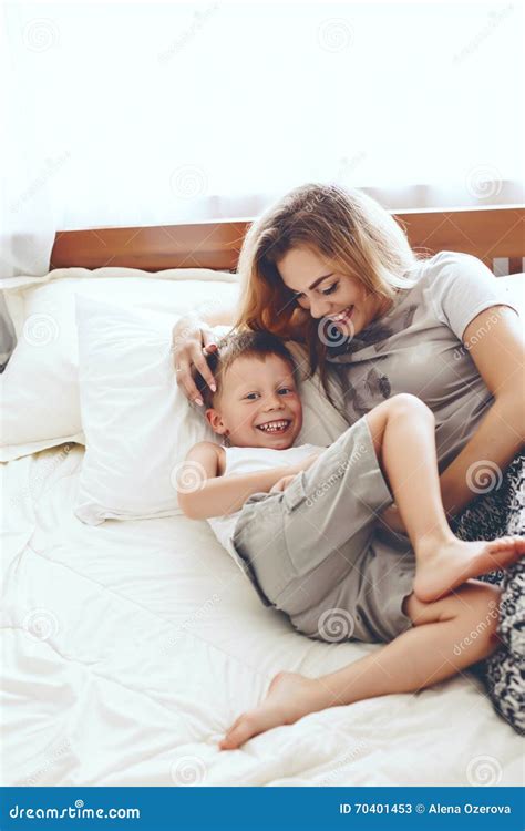 Mother Plays With Son In Bed Stock Image Image Of Mama Loving 70401453
