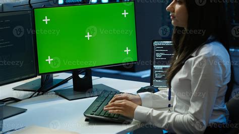 System Administrator In Data Center Installing Software On Green Screen