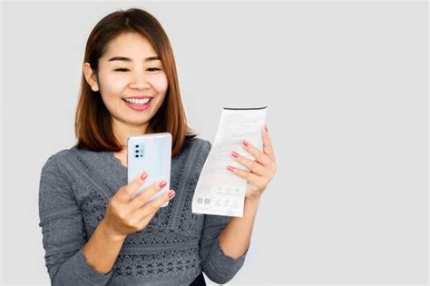 Premium Photo Asian Woman Use Mobile Phone Scanning Qr Code On Bill