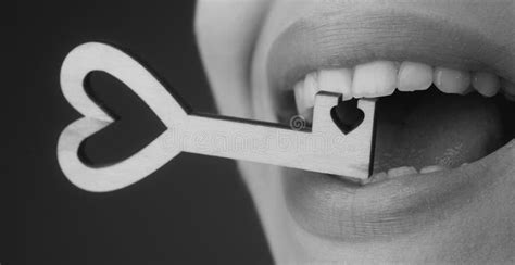 Language Barrier Secret Concept Wood Key In Lips Close Up Stock