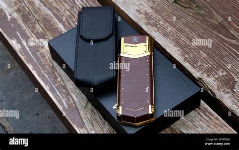Black Luxury Phone And Black Leather Case Stock Photo Alamy