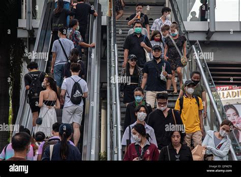 People Wearing Face Masks As A Preventive Measure Against The Spread Of
