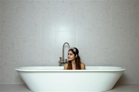 Premium Ai Image Cropped Portrait Of A Young Woman In The Bath