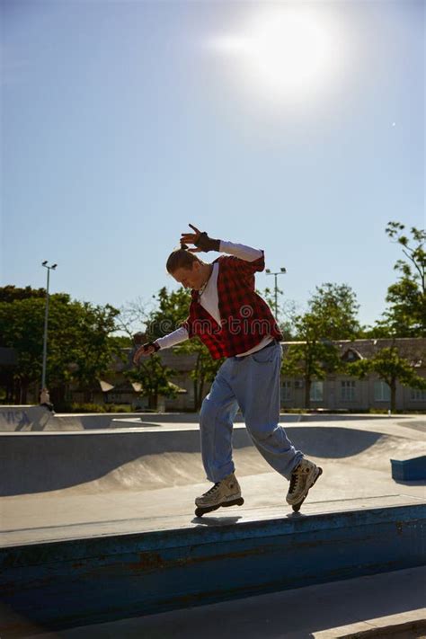 Teenager Rollerskater Balancing On Pedestal Performing Extremely Ride