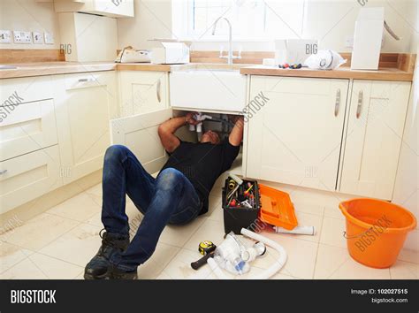 Plumber Lying On His Image Photo Free Trial Bigstock