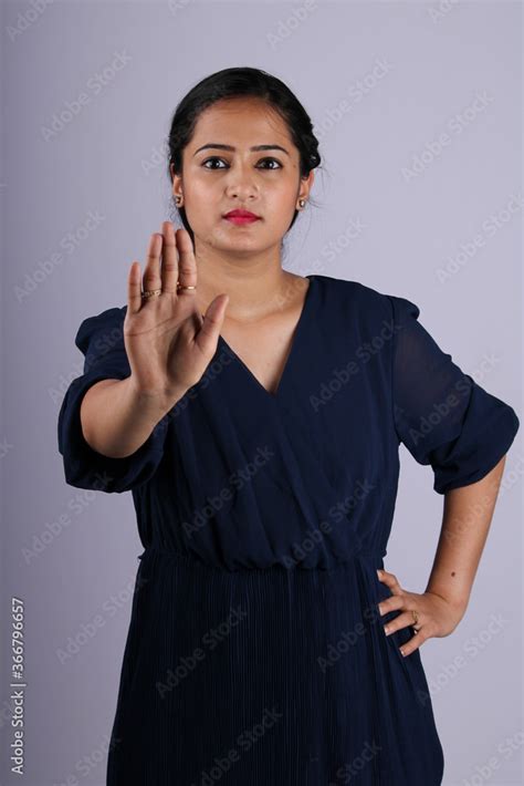Beautiful Indian Girl Taking Tough Stance And Saying No Stop With Her