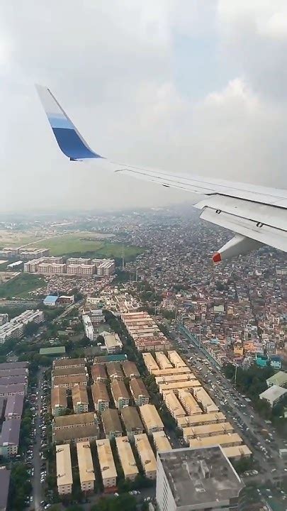 Aerial View From The Window Of The Plane While It Will Land To Ninoy Aquino International