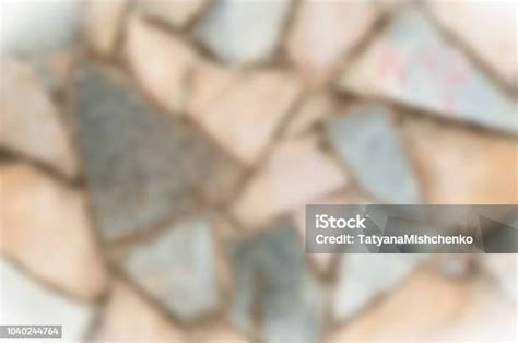 흐리게 배경입니다 디자이너 질감 배경 이미지에 대 한 친절 한 화강암 돌은 울타리에서 복잡 한 돌 벽 접시와 배경입니다 벽 텍스처에서 추상 화강암 0명에 대한 스톡 사진 및