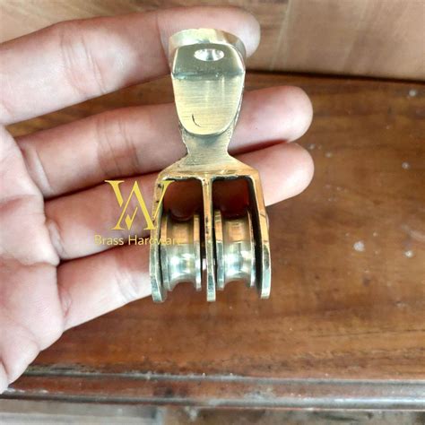 Katrol Kuningan Mini Model Tunggal And Ganda Katrol Mini 1 Pcs Lazada Indonesia