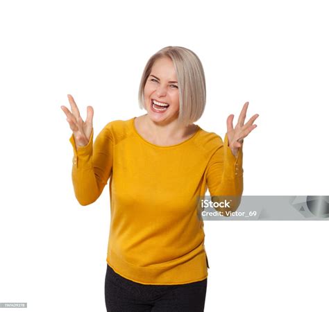 Middle Aged Blonde Emotionally Posing In A Studio Happy Woman In Yellow