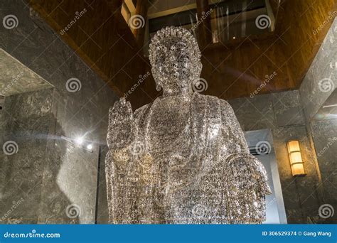 The Sculpture Of The Famous Chinese Musician Nie Er Is Located In A