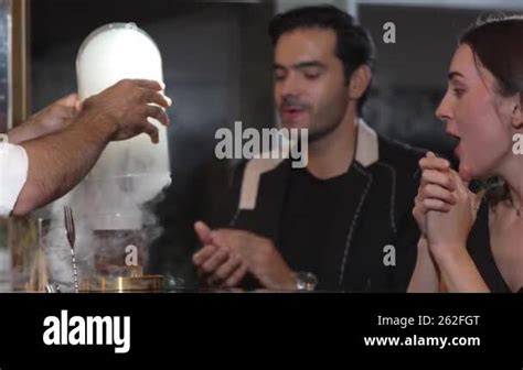 Cropped Hand Bartender Serving Mist Smoky Classical Mixing Whiskey With