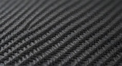 A Close Up Of A Black And White Textured Surface With A Black Textured Surface Premium Ai