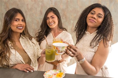Premium Photo Woman Toasting And Celebrating With Juices And Tea